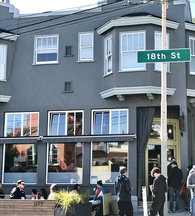 That iconic yellow door isn't just an entrance&mdash;it's a portal to pancake paradise in San Francisco's Inner Sunset neighborhood.