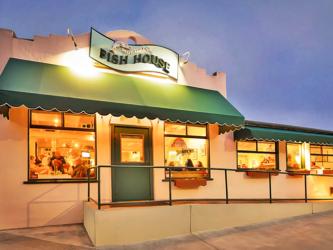 The unassuming exterior of Monterey's Fish House glows with promise at dusk, like a lighthouse beckoning hungry sailors home.