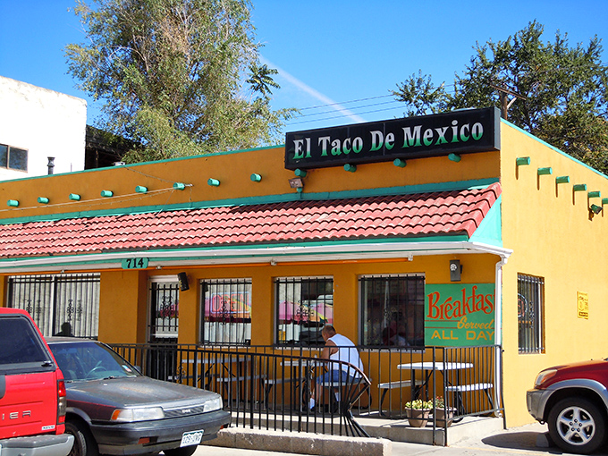 The little yellow building that launched a thousand road trips. El Taco de Mexico's vibrant exterior promises authentic delights within.