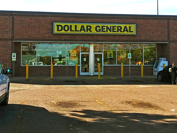 The brick facade of Dollar General stands proudly against Colorado's blue sky, like a yellow-signed beacon of bargains beckoning budget-conscious shoppers to enter its treasure-filled realm.
