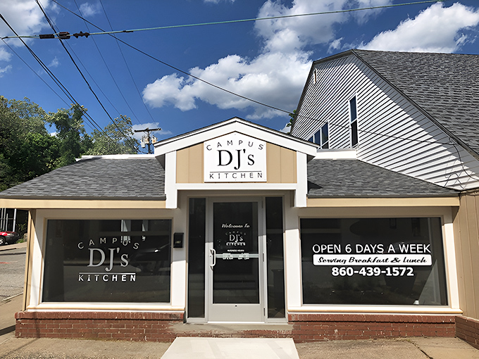 The iconic teal awning of DJ's Campus Kitchen beckons breakfast lovers like a lighthouse for the hungry souls of New London.