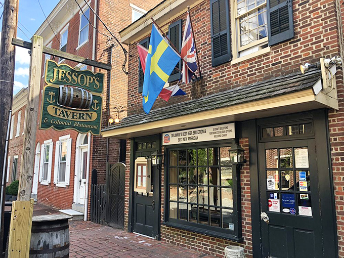 The historic fa&ccedil;ade of Jessop's Tavern welcomes you with international flags and colonial charm. History never looked so deliciously inviting!