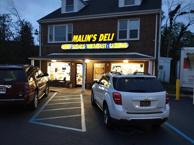 The unassuming brick facade of Malin's Deli stands like a time capsule of authentic American sandwich craftsmanship, proudly waving its flag over Newark's culinary landscape.