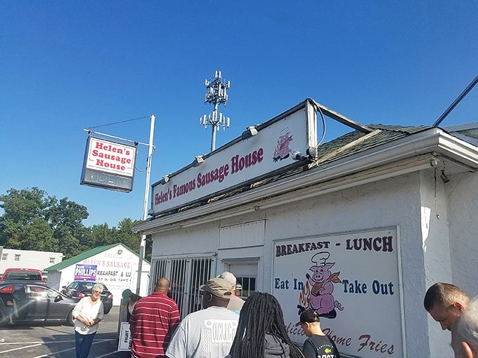 The unassuming white exterior of Helen's Sausage House might fool you, but that line of hungry patrons at dawn tells the real story.