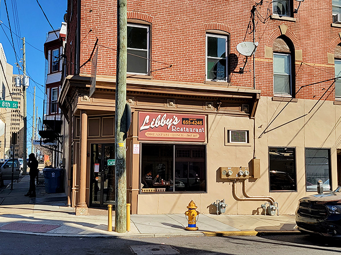 The unassuming storefront of Libby's Restaurant beckons with its classic signage and glowing "OPEN" sign—a breakfast beacon that's been drawing Wilmington locals for generations.