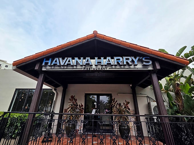 The terracotta-roofed entrance to Havana Harry's stands like a portal to Cuban culinary paradise, promising delicious adventures beyond its doors.
