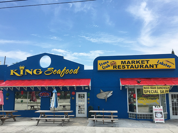 The blue facade of King Seafood shines like a maritime beacon, promising fresh catches and Florida flavor in equal measure.