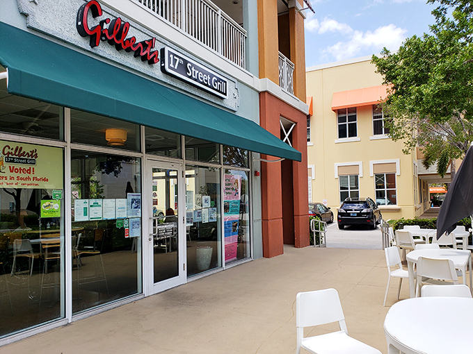 That red neon sign isn't just illuminating the night&mdash;it's a beacon calling to burger lovers everywhere. Simple storefront, extraordinary flavors waiting inside.