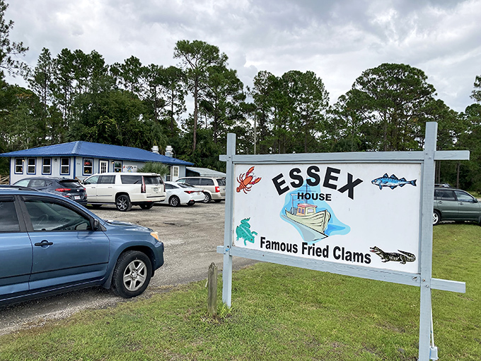 The blue-roofed beacon of seafood salvation sits unassumingly in Pierson, promising "Famous Fried Clams" that have seafood pilgrims filling the parking lot daily.