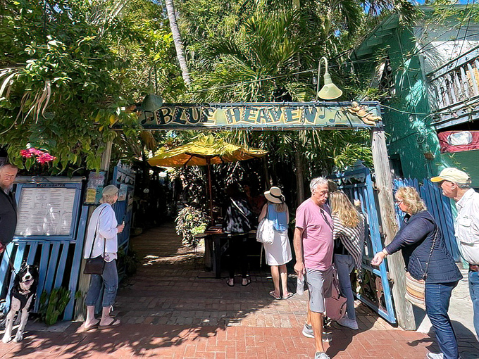 The entrance to Blue Heaven feels like stepping through a portal to a tropical wonderland where time slows down and appetites awaken.