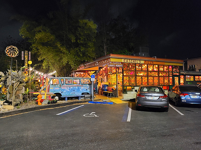 Nighttime magic at Satchel's, where that glowing blue VW van isn't waiting for Woodstock attendees&mdash;it's actually prime dining real estate!