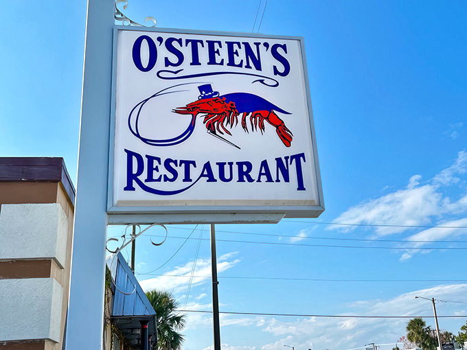 The unassuming exterior of O'Steen's, where that wooden bench isn't just seating&mdash;it's the waiting room for some of Florida's finest seafood.