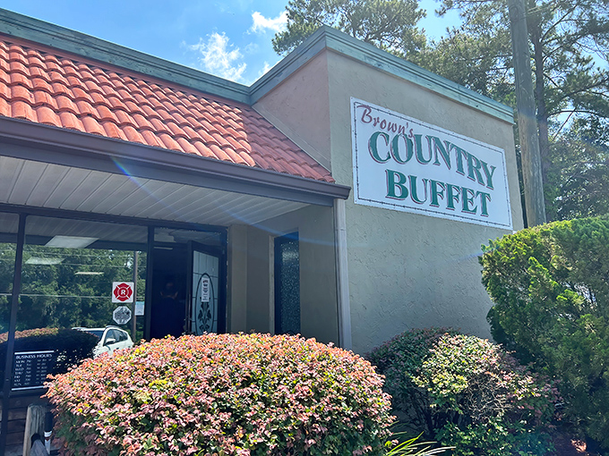 The unassuming exterior of Brown's Country Buffet proves once again that the best Southern food often hides behind the most modest facades.