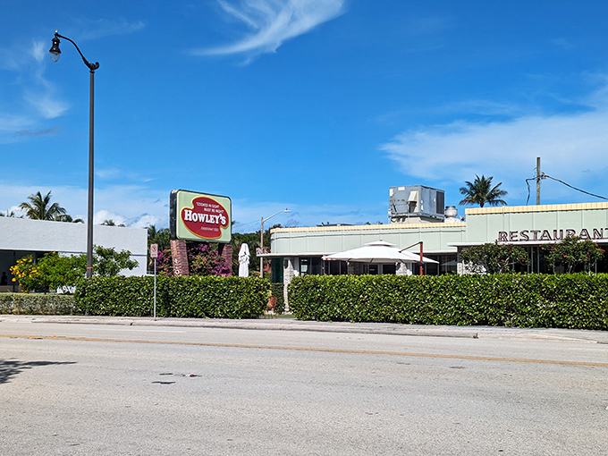 Mint-green dreams and retro vibes! Howley's exterior beckons with mid-century charm that promises comfort food magic within those welcoming walls.