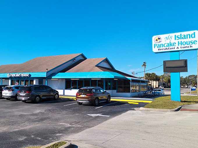 The bright turquoise exterior of My Island Pancake House stands out like a breakfast oasis in Rockledge, beckoning hungry travelers with promises of pancake paradise.