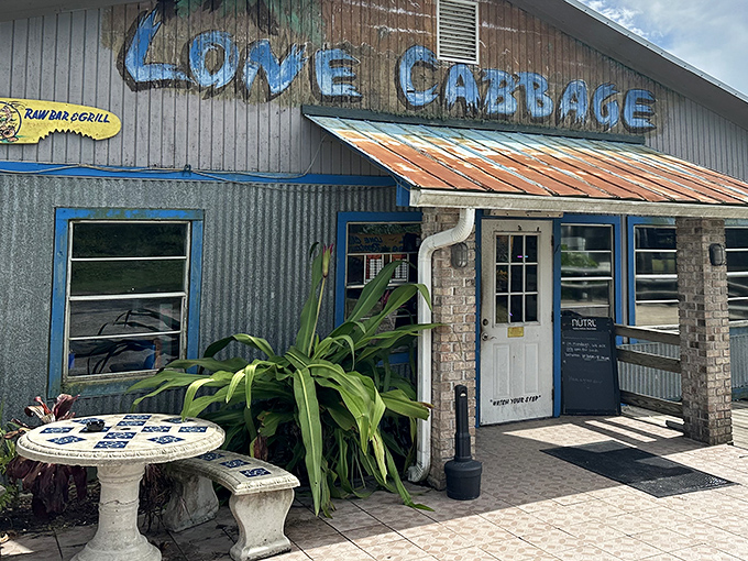 Florida authenticity doesn't get more real than this weathered exterior with its hand-painted sign and corrugated metal charm. Old Florida lives on!