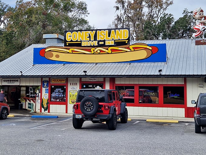 The giant hot dog sign beckons like a neon lighthouse for the hungry. Brooksville's temple to tubular meat awaits!