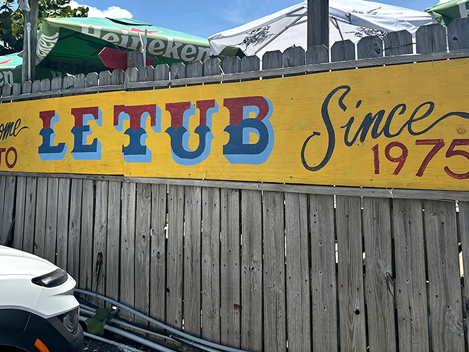 The bright yellow sign says it all: Le Tub has been a Hollywood institution since 1975, promising quirky charm before you even step inside.