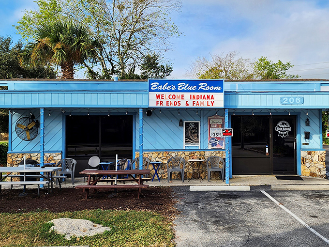The little blue building that could! Babe's Blue Room's vibrant exterior stands as a colorful beacon for hungry travelers seeking authentic Florida comfort food.