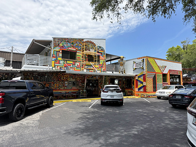 Where art meets appetite! Satchel's exterior features a vintage airplane perched above the entrance, setting the tone for the whimsical experience awaiting inside.