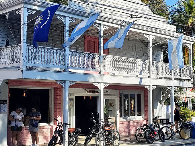 Classic Key West architecture meets Argentina as blue and white flags flutter above this charming building. Bicycles parked outside suggest the perfect island transportation method.