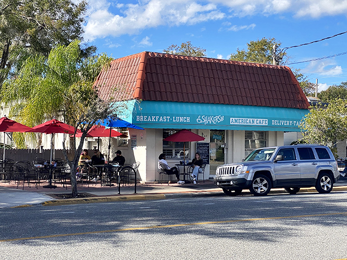 The iconic teal awning and terracotta roof of Shakers American Caf&eacute; stands as a breakfast beacon in Orlando's College Park neighborhood. Florida sunshine included at no extra charge!