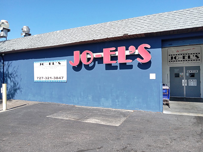 The blue exterior of JO-EL'S stands out like a sapphire in St. Petersburg's landscape, promising authentic Jewish deli treasures within those humble walls.