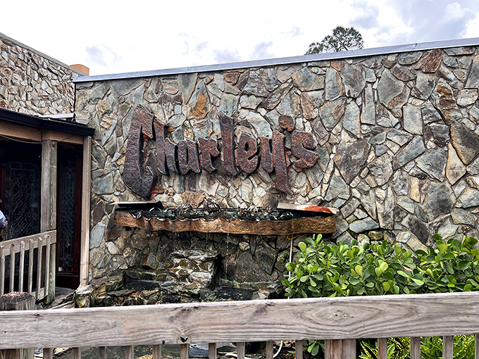 The stone facade of Charley's stands like a culinary fortress, promising old-school excellence behind those wooden doors where lobster legends are born.