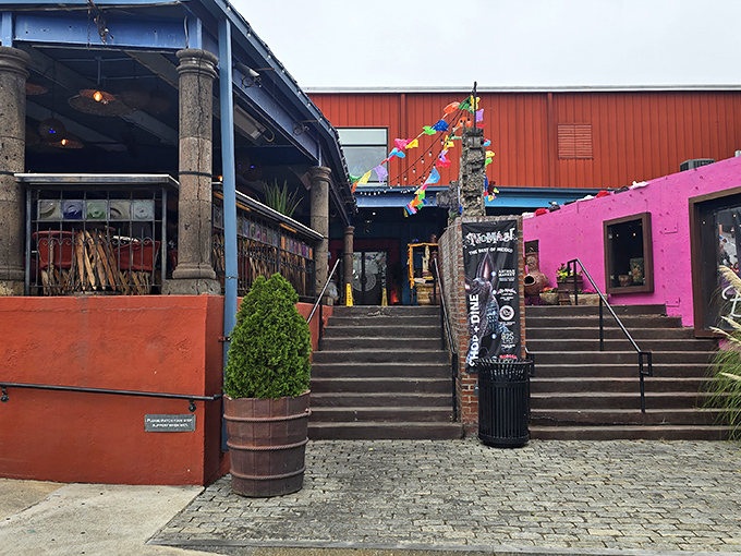 The striking red exterior of No Mas! Cantina beckons like a siren song for hungry souls wandering through Atlanta's Castleberry Hill district.