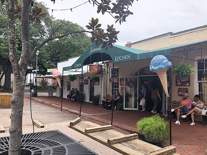 The entrance to sugar paradise beckons with its lush hanging ferns and iconic green awning. Resistance is futile&mdash;your inner child has already decided to go in.