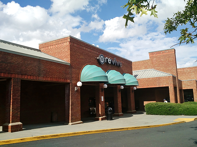 Revive's distinctive brick fa&ccedil;ade with teal awnings stands like a beacon for bargain hunters. It's not just a store&mdash;it's a treasure hunt with a roof.
