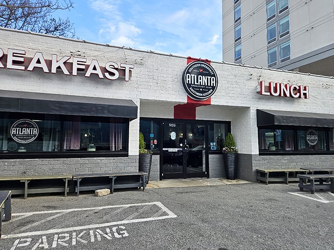 The breakfast pilgrimage begins here—a humble white brick building where culinary dreams come true and weekend lines form with good reason.