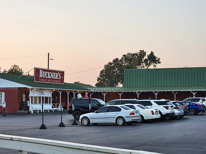 The red barn-like exterior of Buckner's stands as a beacon of Southern comfort food, promising family-style feasts worth the drive from anywhere in Georgia.