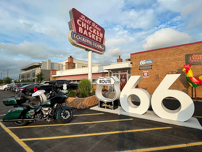 The iconic neon sign beckons hungry travelers like a lighthouse for comfort food enthusiasts. Route 66 history never tasted so good!