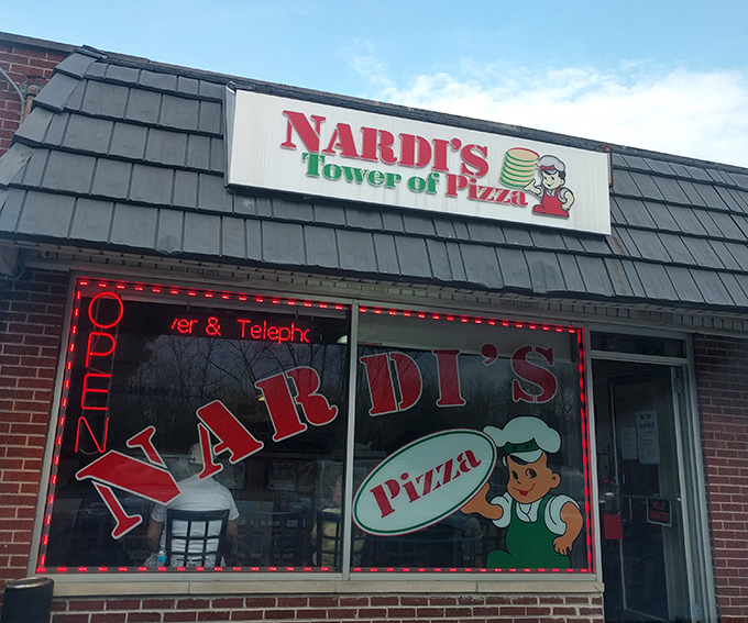 The unassuming storefront of Nardi's Tower of Pizza stands like a culinary time capsule in Addison, promising Italian-American delights that transcend its modest exterior.