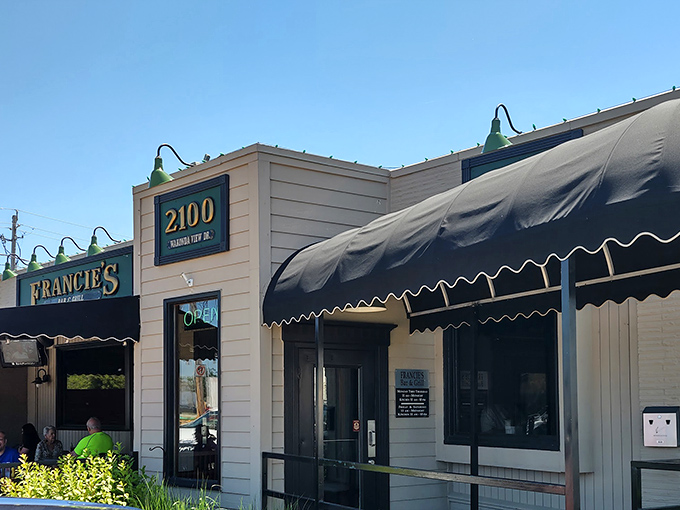 The unassuming exterior of Francie's hides culinary treasures within, like finding a diamond in a potato field. Those green awnings have sheltered countless hungry pilgrims.