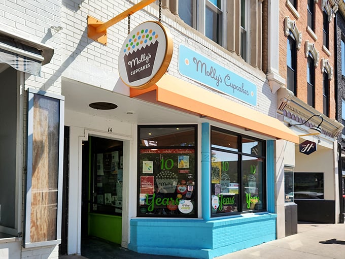 The blue and orange storefront of Molly's Cupcakes stands out on Iowa City's Washington Street like a dessert oasis in a sea of brick buildings.