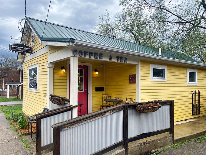 The cheerful yellow exterior with its bright red door isn't just inviting&mdash;it's practically shouting "Get in here and eat something delicious!" Small but mighty, this cottage houses some serious culinary magic.