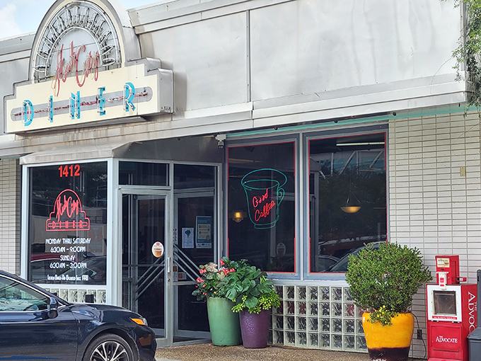 The neon-kissed facade of Hub City Diner beckons like a lighthouse for the hungry, promising retro charm and comfort food salvation.