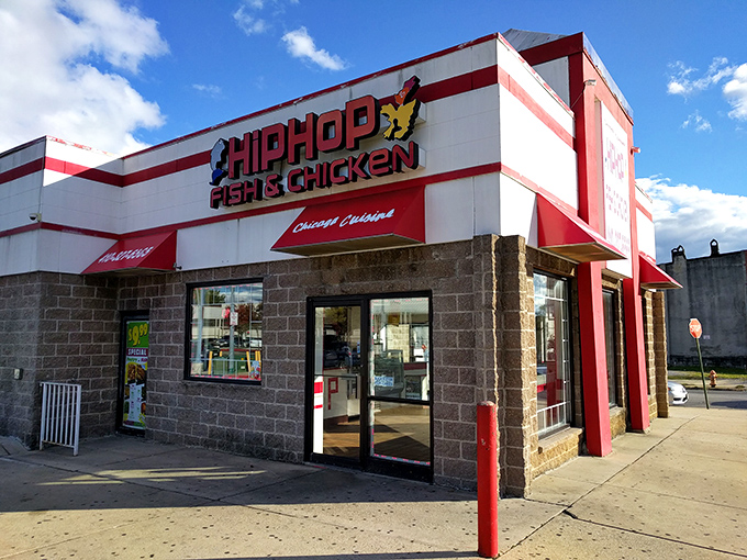 The red and white exterior of Hip Hop Fish & Chicken stands out like a beacon of fried goodness on Baltimore's landscape. Culinary treasures await inside!