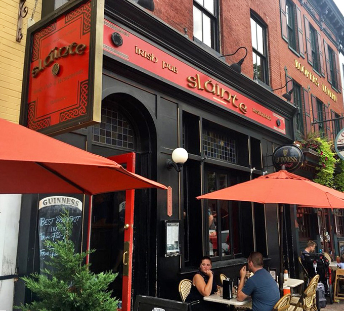 The crimson fa&ccedil;ade of Slainte stands proudly on Thames Street, Irish flag waving between American ones&mdash;a diplomatic sandwich of international goodwill.