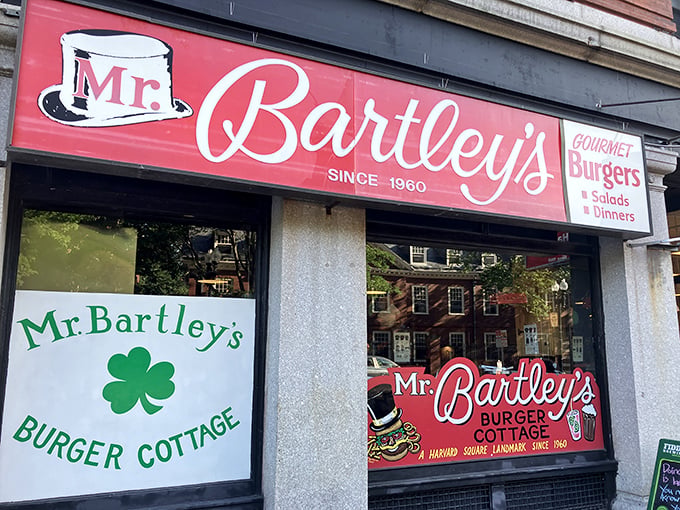 The iconic red signage of Mr. Bartley's stands as a beacon of burger excellence in Harvard Square, promising culinary salvation to hungry scholars and visitors alike.