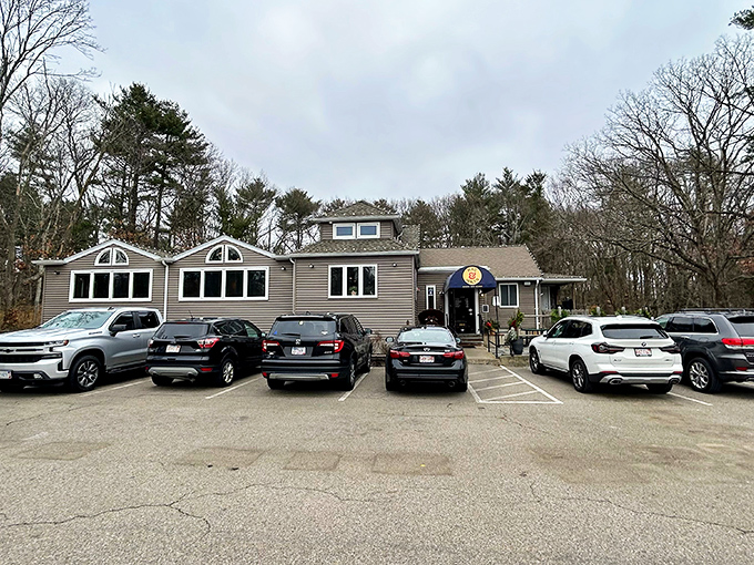 The unassuming exterior of Mac & Walt's proves once again that the best comfort food often hides in plain sight among New England's pines.