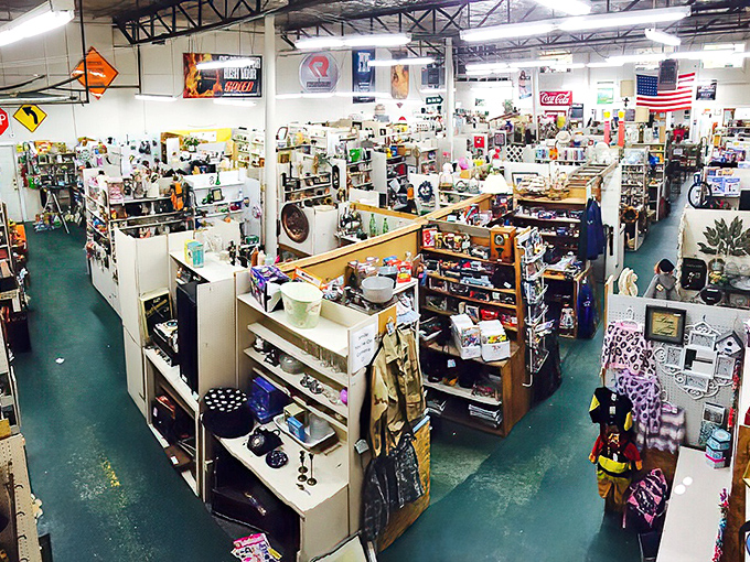 A treasure hunter's paradise stretches before you, with American flags hanging proudly overhead and vendor booths creating a labyrinth of possibility.