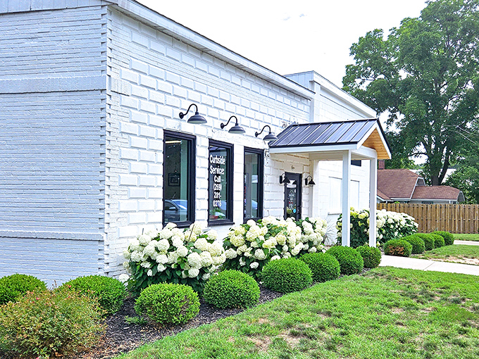 The unassuming white brick exterior of Red Coach Donuts in Stevensville hides a treasure trove of sugary delights waiting inside.