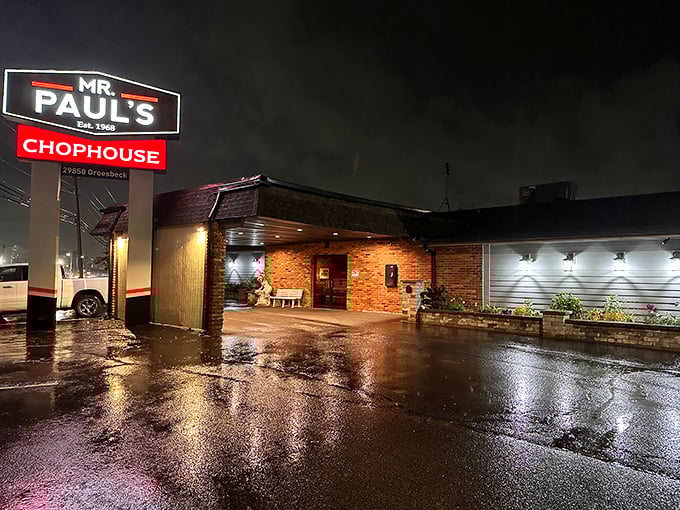 A modest brick exterior belies the culinary treasures within—Mr. Paul's neon sign stands as a beacon for prime rib pilgrims on rainy Michigan nights.