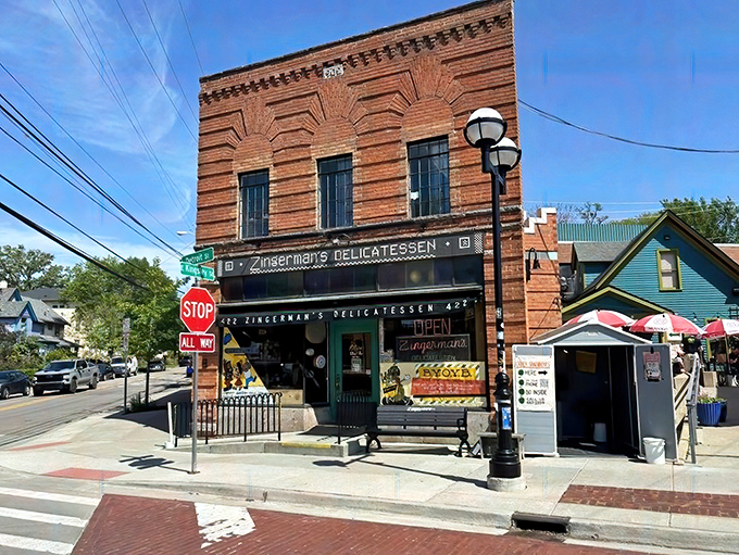 The iconic red brick exterior of Zingerman's stands like a beacon of sandwich salvation on the corner of Detroit and Kingsley Streets in Ann Arbor.