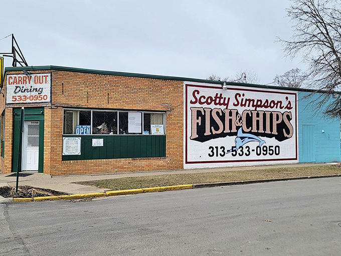 The yellow sign beckons like a lighthouse for hungry souls. This unassuming brick building on Fenkell Avenue has been Detroit's temple of fried fish for generations.