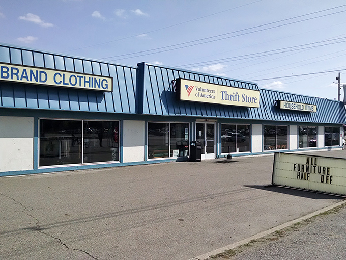 The blue-roofed bargain kingdom beckons with promises of "Brand Clothing" and treasures waiting to be discovered inside.