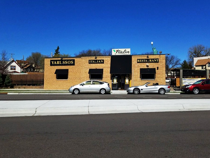 The unassuming exterior of Yarusso Bros stands like a culinary sentinel in St. Paul's East Side, promising Italian treasures within those brick walls.